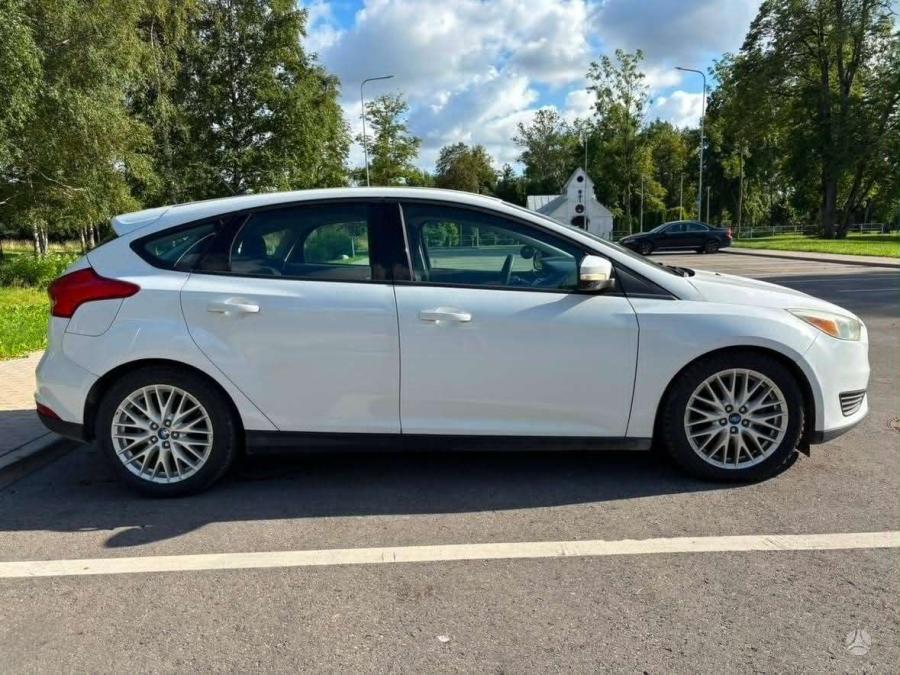 White Ford Focus 2015 in Siauliai, with an engine capacity of 2.00 L and mileage of 91 thousand km for 6300 €, photo 4 on AUTOMOTO.COM.LV