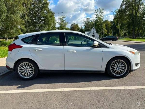 White Ford Focus 2015 in Siauliai, with an engine capacity of 2.00 L and mileage of 91 thousand km for 6300 €, photo 4 on AUTOMOTO.COM.LV