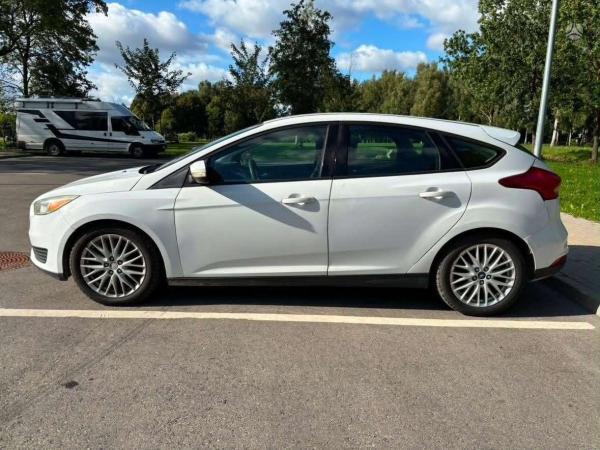 White Ford Focus 2015 in Siauliai, with an engine capacity of 2.00 L and mileage of 91 thousand km for 6300 €, photo 8 on AUTOMOTO.COM.LV