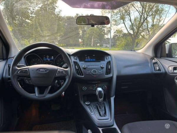 White Ford Focus 2015 in Siauliai, with an engine capacity of 2.00 L and mileage of 91 thousand km for 6300 €, photo 11 on AUTOMOTO.COM.LV