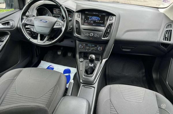 White Ford Focus 2016 in Taurage, with an engine capacity of 1.00 L and mileage of 146 thousand km for 4790 €, photo 8 on AUTOMOTO.COM.LV
