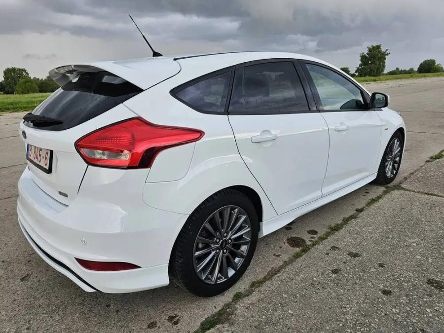 White Ford Focus 2016 in Riga, with an engine capacity of 1.00 L and mileage of 203 thousand km for 6450 €, photo 8 on AUTOMOTO.COM.LV