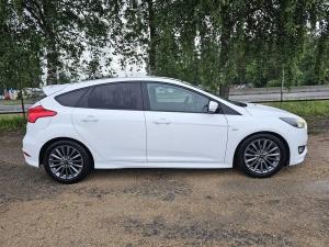 White Ford Focus 2016 in Riga, with an engine capacity of 1.00 L and mileage of 203 thousand km for 6450 €, photo 9 on AUTOMOTO.COM.LV