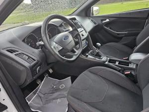 White Ford Focus 2016 in Riga, with an engine capacity of 1.00 L and mileage of 203 thousand km for 6450 €, photo 11 on AUTOMOTO.COM.LV