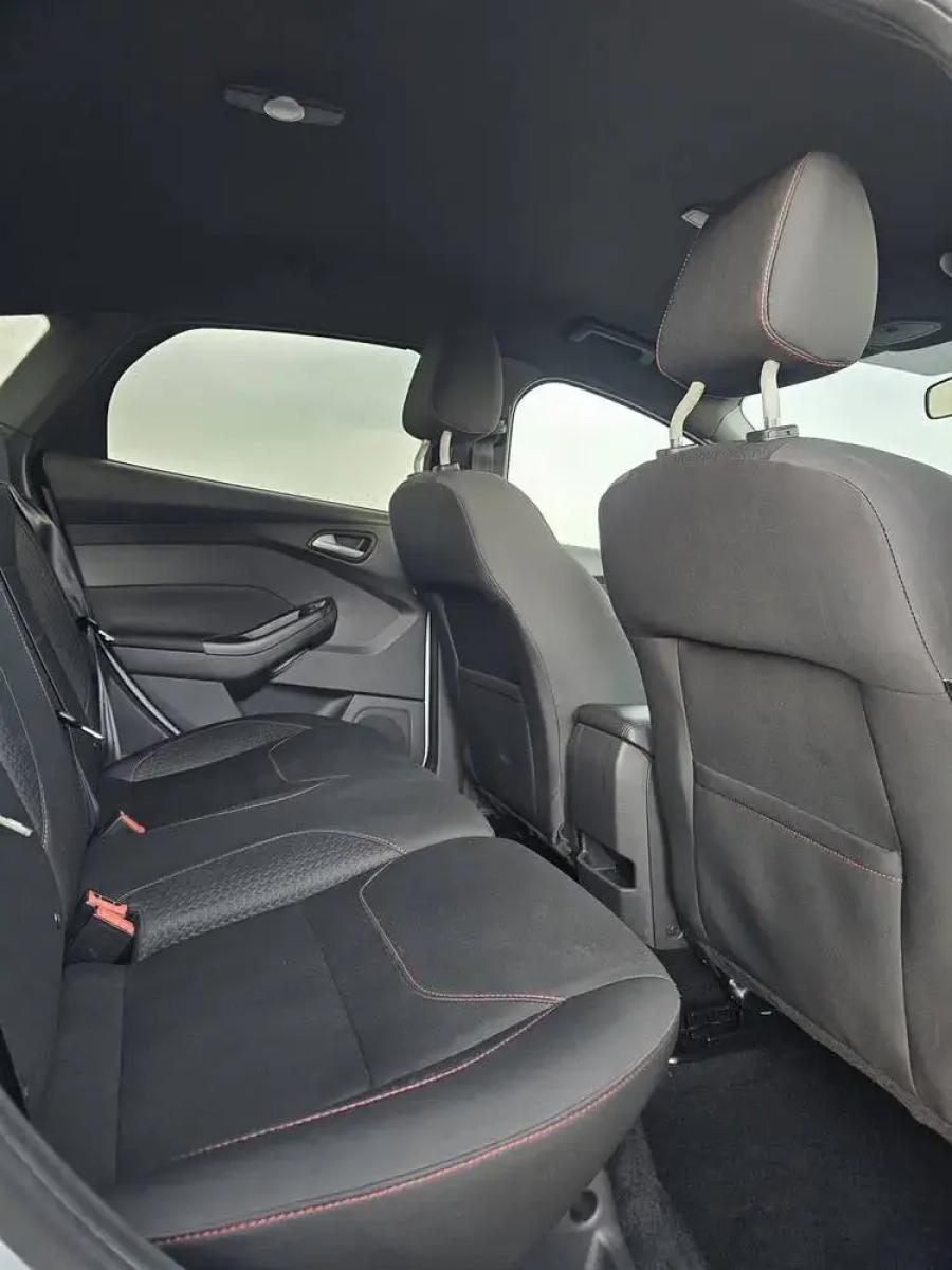 White Ford Focus 2016 in Riga, with an engine capacity of 1.00 L and mileage of 203 thousand km for 6450 €, photo 15 on AUTOMOTO.COM.LV