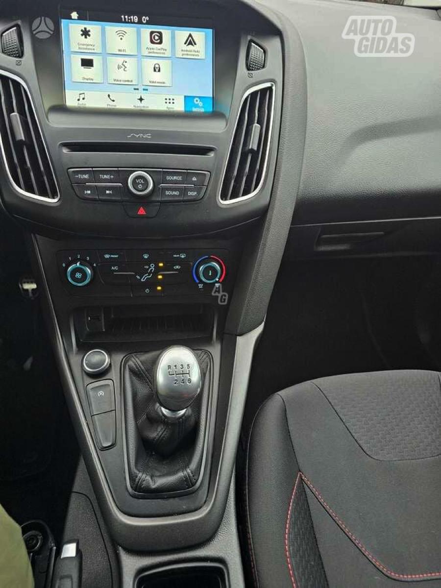 White Ford Focus 2018 in Sirvintos, with an engine capacity of 1.50 L and mileage of 170 thousand km for 10500 €, photo 18 on AUTOMOTO.COM.LV