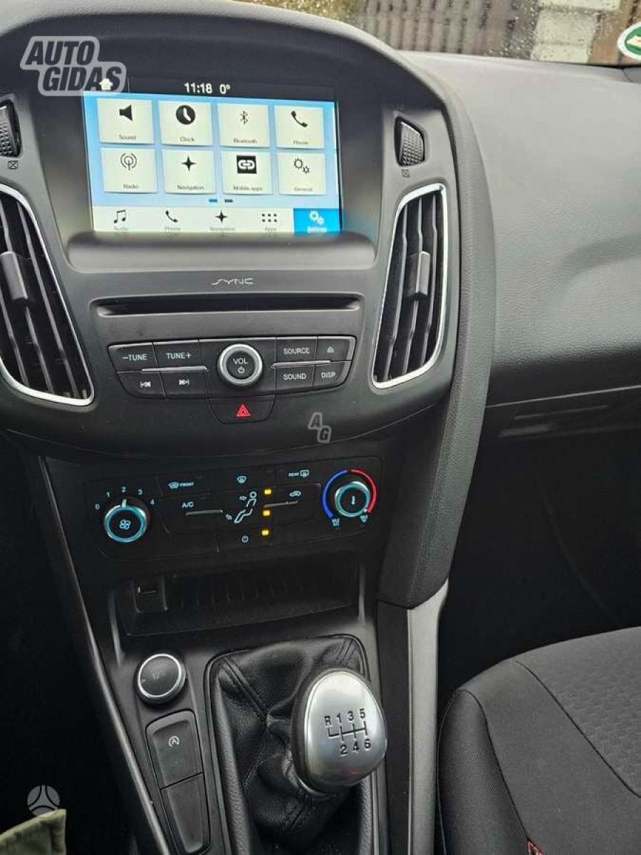 White Ford Focus 2018 in Sirvintos, with an engine capacity of 1.50 L and mileage of 170 thousand km for 10500 €, photo 16 on AUTOMOTO.COM.LV