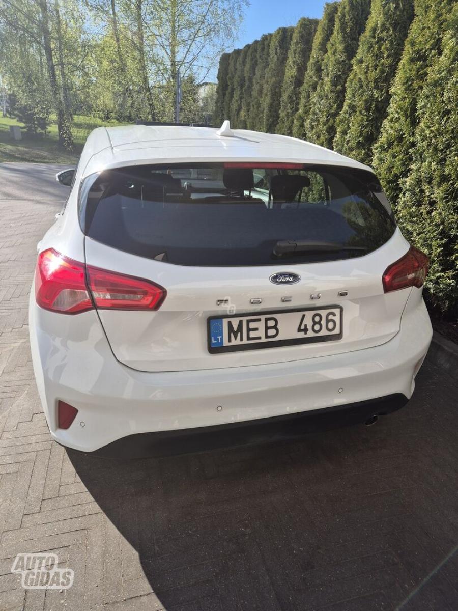 White Ford Focus 2019 in Vilnius, with an engine capacity of 1.50 L and mileage of 192 thousand km for 6900 €, photo 3 on AUTOMOTO.COM.LV