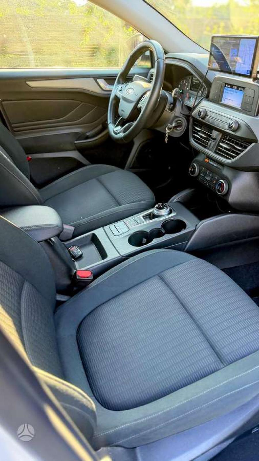 White Ford Focus 2019 in Marijampole, with an engine capacity of 1.00 L and mileage of 106 thousand km for 8700 €, photo 16 on AUTOMOTO.COM.LV