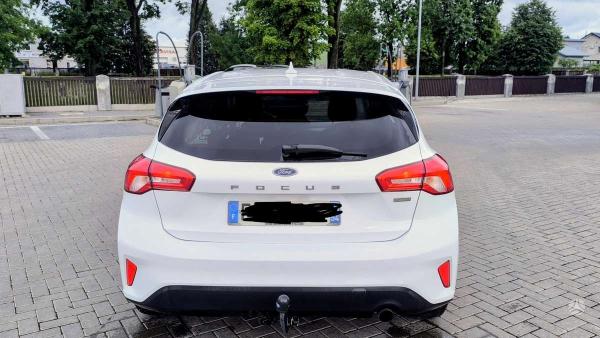 White Ford Focus 2020 in Taurage, with an engine capacity of 1.00 L and mileage of 124 thousand km for 5800 €, photo 6 on AUTOMOTO.COM.LV