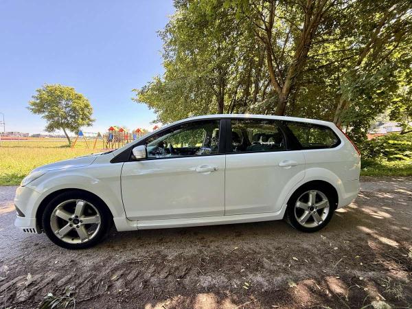 White Ford Focus 2009 in Kaunas, with an engine capacity of 1.56 L and mileage of 250 thousand km for 2350 €, photo 7 on AUTOMOTO.COM.LV