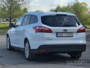 White Ford Focus 2011 in Liepaja, with an engine capacity of 1.60 L and mileage of 224 thousand km for 4500 €, photo 9 on AUTOMOTO.COM.LV