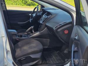 White Ford Focus 2011 in Liepaja, with an engine capacity of 1.60 L and mileage of 224 thousand km for 4500 €, photo 18 on AUTOMOTO.COM.LV