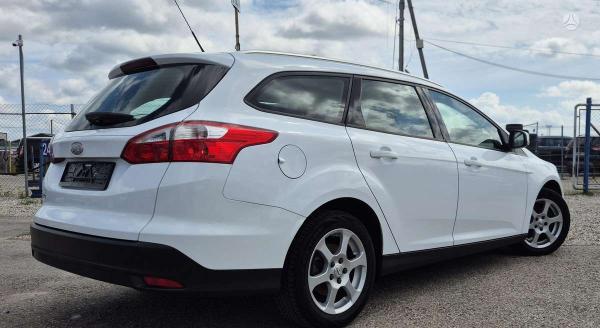 White Ford Focus 2011 in Kaunas, with an engine capacity of 1.60 L and mileage of 200 thousand km for 2550 €, photo 4 on AUTOMOTO.COM.LV