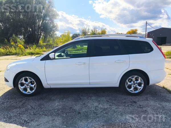 White Ford Focus 2011 in Riga, with an engine capacity of 1.60 L and mileage of 234 thousand km for 2790 €, photo 11 on AUTOMOTO.COM.LV