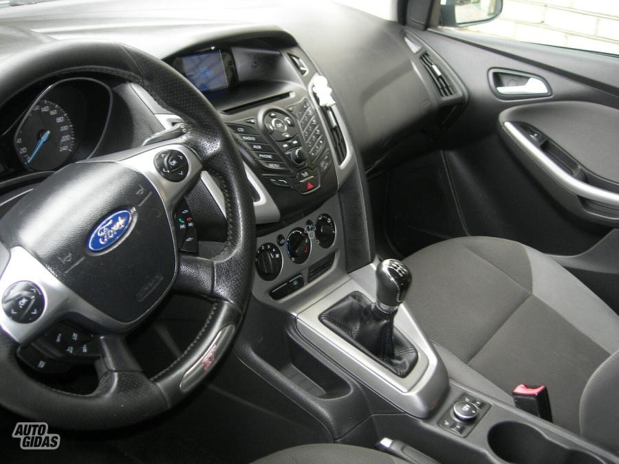 White Ford Focus 2012 in Kaunas, with an engine capacity of 1.60 L and mileage of 319 thousand km for 2199 €, photo 14 on AUTOMOTO.COM.LV