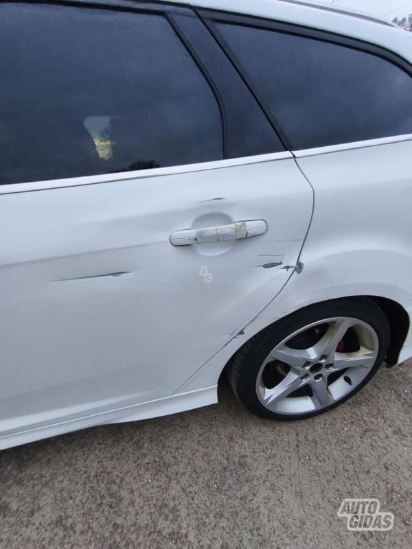 White Ford Focus 2012 in Sakiai, with an engine capacity of 2.00 L and mileage of 300 thousand km for 2700 €, photo 3 on AUTOMOTO.COM.LV