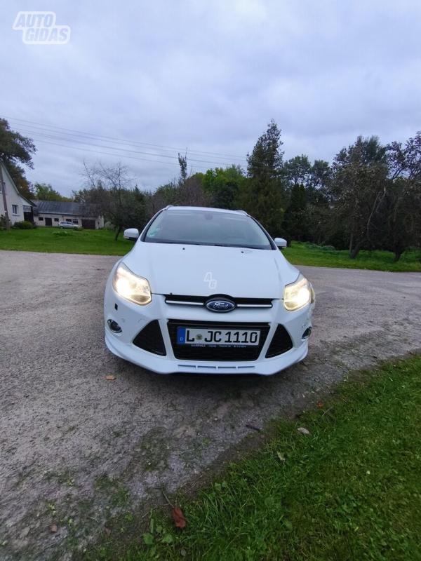 White Ford Focus 2012 in Sakiai, with an engine capacity of 2.00 L and mileage of 300 thousand km for 2700 €, photo 11 on AUTOMOTO.COM.LV
