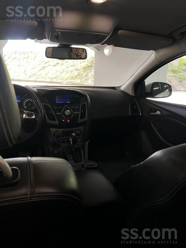 White Ford Focus 2013 in Riga, with an engine capacity of 2.00 L and mileage of 402 thousand km for 4100 €, photo 7 on AUTOMOTO.COM.LV