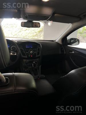 White Ford Focus 2013 in Riga, with an engine capacity of 2.00 L and mileage of 402 thousand km for 4100 €, photo 8 on AUTOMOTO.COM.LV