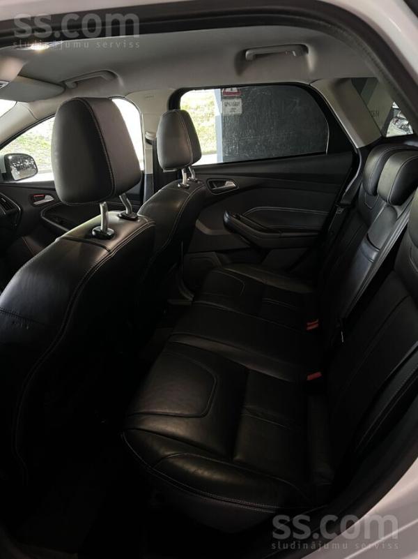 White Ford Focus 2013 in Riga, with an engine capacity of 2.00 L and mileage of 402 thousand km for 4100 €, photo 8 on AUTOMOTO.COM.LV