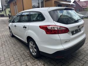 White Ford Focus 2014 in Prienai, with an engine capacity of 1.00 L and mileage of 200 thousand km for 1600 €, photo 4 on AUTOMOTO.COM.LV
