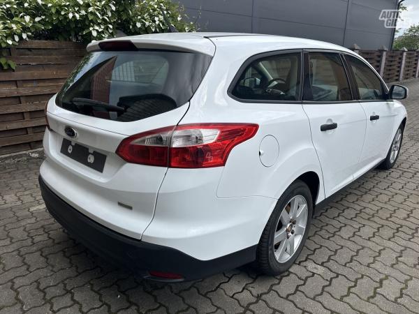 White Ford Focus 2014 in Prienai, with an engine capacity of 1.00 L and mileage of 200 thousand km for 1600 €, photo 4 on AUTOMOTO.COM.LV