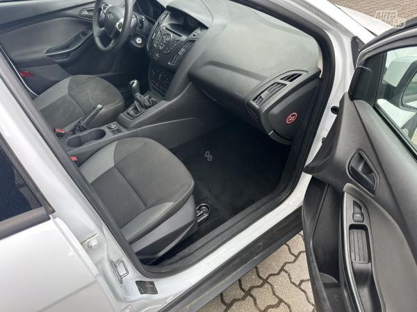 White Ford Focus 2014 in Prienai, with an engine capacity of 1.00 L and mileage of 200 thousand km for 1600 €, photo 6 on AUTOMOTO.COM.LV