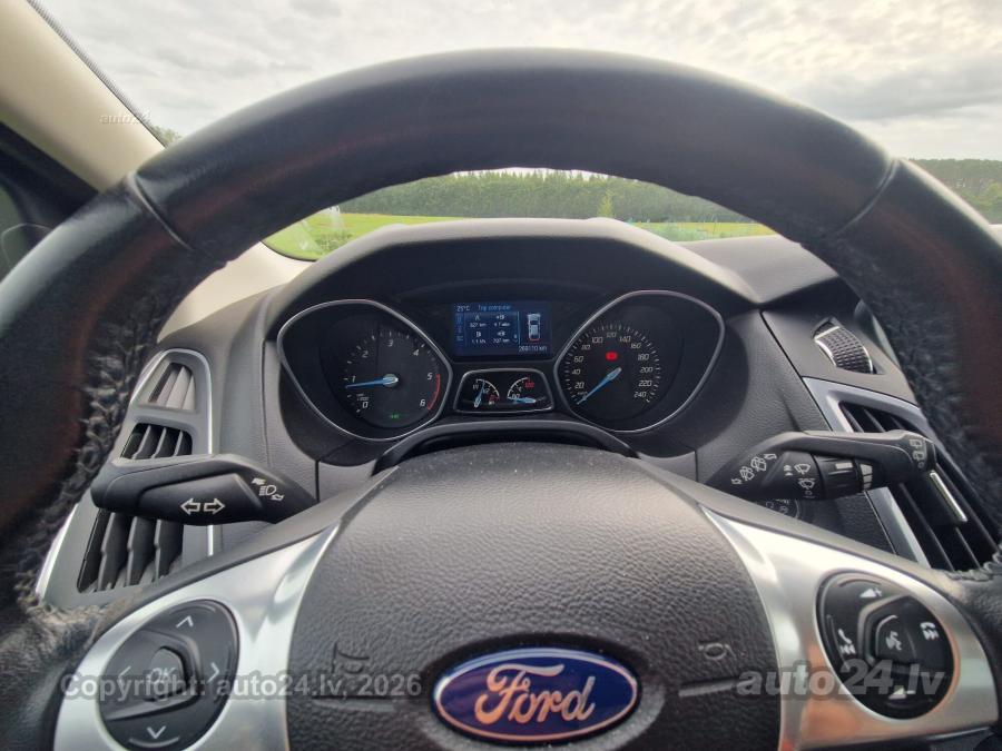 White Ford Focus 2014 in Tallinn, with an engine capacity of 1.60 L and mileage of 270 thousand km for 3999 €, photo 7 on AUTOMOTO.COM.LV