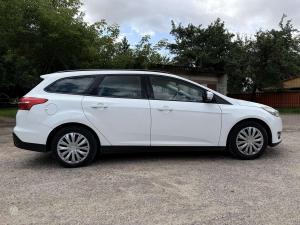 White Ford Focus 2015 in Kaunas, with an engine capacity of 1.56 L and mileage of 197 thousand km for 3999 €, photo 4 on AUTOMOTO.COM.LV
