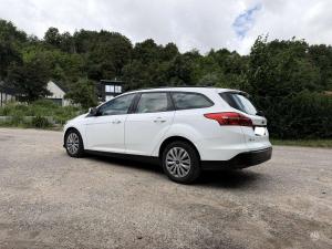 White Ford Focus 2015 in Kaunas, with an engine capacity of 1.56 L and mileage of 197 thousand km for 3999 €, photo 7 on AUTOMOTO.COM.LV