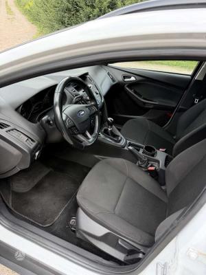 White Ford Focus 2015 in Kaunas, with an engine capacity of 1.56 L and mileage of 197 thousand km for 3999 €, photo 10 on AUTOMOTO.COM.LV