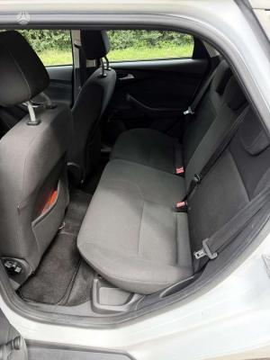 White Ford Focus 2015 in Kaunas, with an engine capacity of 1.56 L and mileage of 197 thousand km for 3999 €, photo 13 on AUTOMOTO.COM.LV