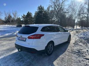 White Ford Focus 2016 in Vilnius, with an engine capacity of 1.00 L and mileage of 309 thousand km for 2750 €, photo 8 on AUTOMOTO.COM.LV