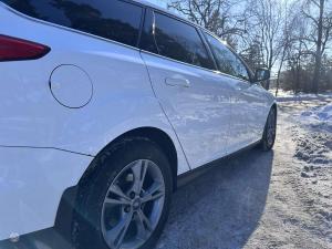 White Ford Focus 2016 in Vilnius, with an engine capacity of 1.00 L and mileage of 309 thousand km for 2750 €, photo 9 on AUTOMOTO.COM.LV