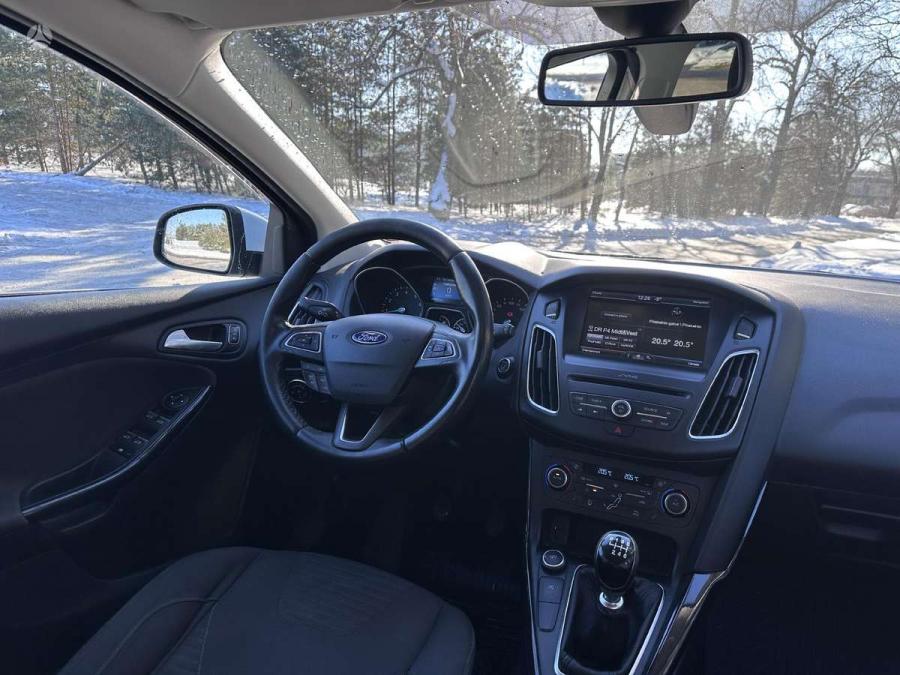 White Ford Focus 2016 in Vilnius, with an engine capacity of 1.00 L and mileage of 309 thousand km for 2750 €, photo 11 on AUTOMOTO.COM.LV