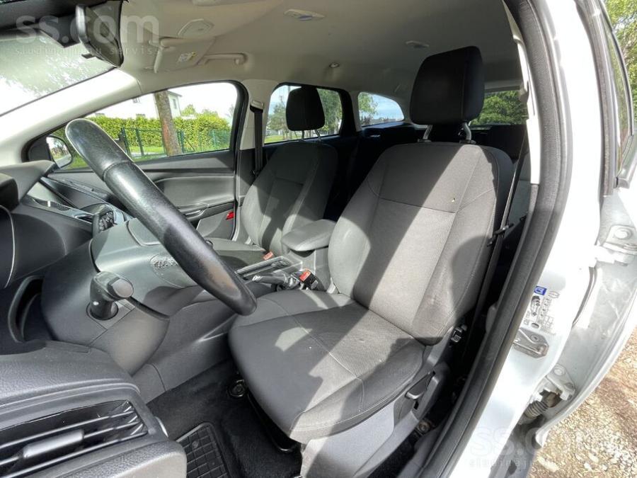 White Ford Focus 2016 in Riga, with an engine capacity of 1.50 L and mileage of 280 thousand km for 4890 €, photo 12 on AUTOMOTO.COM.LV