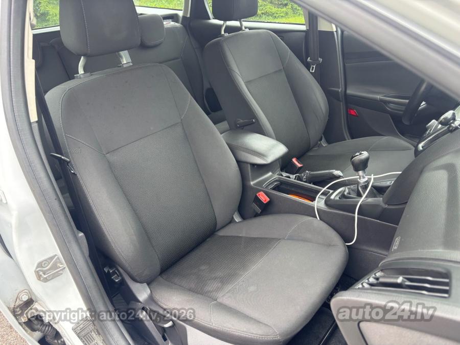 White Ford Focus 2016 in Tallinn, with an engine capacity of 1.50 L and mileage of 312 thousand km for 4490 €, photo 13 on AUTOMOTO.COM.LV
