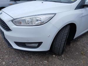 White Ford Focus 2016 in Utena, with an engine capacity of 1.50 L and mileage of 250 thousand km for 4200 €, photo 12 on AUTOMOTO.COM.LV