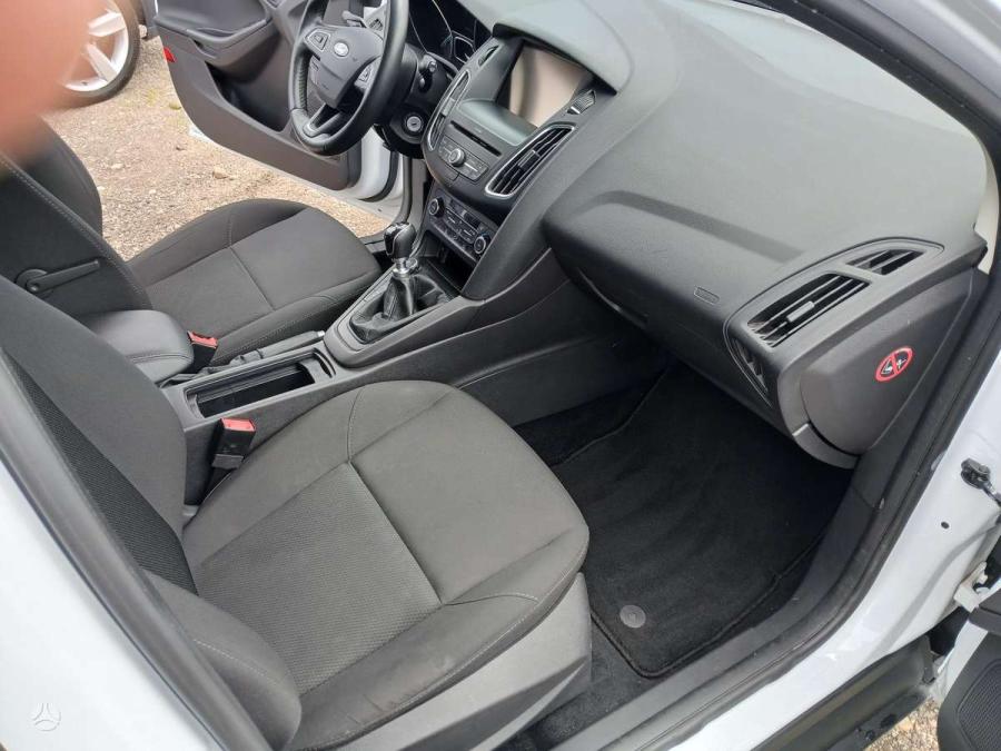 White Ford Focus 2016 in Utena, with an engine capacity of 1.50 L and mileage of 250 thousand km for 4200 €, photo 13 on AUTOMOTO.COM.LV