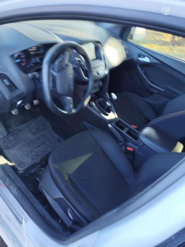 White Ford Focus 2017 in Silute, with an engine capacity of 0.00 L and mileage of 202 thousand km for 3999 €, photo 7 on AUTOMOTO.COM.LV