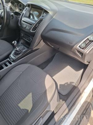 White Ford Focus 2017 in Riga, with an engine capacity of 1.50 L and mileage of 362 thousand km for 4600 €, photo 12 on AUTOMOTO.COM.LV