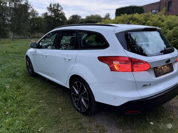 White Ford Focus 2017 in Marijampole, with an engine capacity of 1.50 L and mileage of 176 thousand km for 4999 €, photo 5 on AUTOMOTO.COM.LV