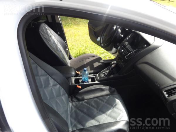 White Ford Focus 2018 in Riga, with an engine capacity of 1.50 L and mileage of 311 thousand km for 7300 €, photo 5 on AUTOMOTO.COM.LV