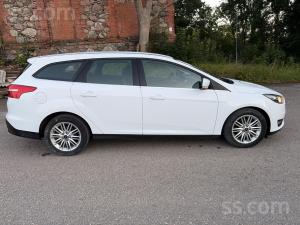 White Ford Focus 2018 in Riga, with an engine capacity of 1.00 L and mileage of 133 thousand km for 7950 €, photo 8 on AUTOMOTO.COM.LV