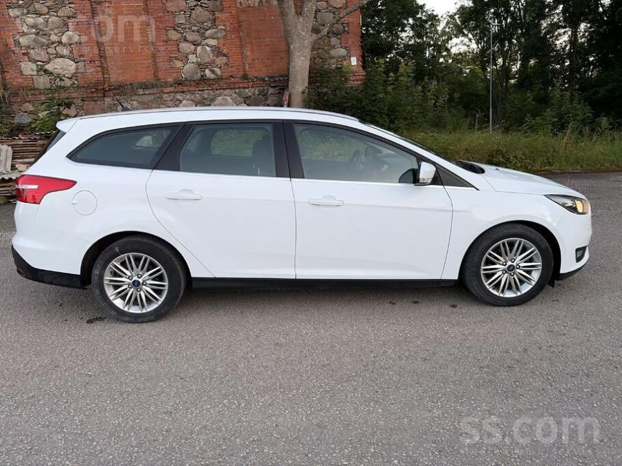 White Ford Focus 2018 in Riga, with an engine capacity of 1.00 L and mileage of 133 thousand km for 7950 €, photo 8 on AUTOMOTO.COM.LV