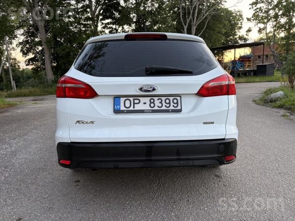 White Ford Focus 2018 in Riga, with an engine capacity of 1.00 L and mileage of 133 thousand km for 7950 €, photo 8 on AUTOMOTO.COM.LV
