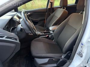 White Ford Focus 2018 in Riga, with an engine capacity of 1.00 L and mileage of 133 thousand km for 7950 €, photo 13 on AUTOMOTO.COM.LV