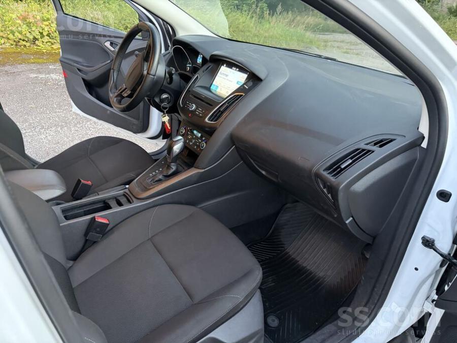 White Ford Focus 2018 in Riga, with an engine capacity of 1.00 L and mileage of 133 thousand km for 7950 €, photo 14 on AUTOMOTO.COM.LV
