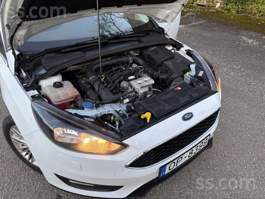 White Ford Focus 2018 in Riga, with an engine capacity of 1.00 L and mileage of 133 thousand km for 7950 €, photo 17 on AUTOMOTO.COM.LV
